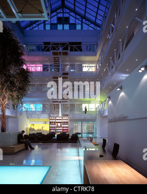 harper collins office atrium view at night Stock Photo - Alamy
