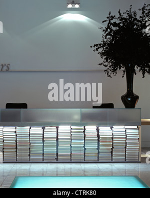 harper collins office reception desk at night Stock Photo - Alamy