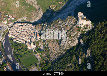 AERIAL VIEW. The citadel of Entrevaux dominated by its castle on a ...