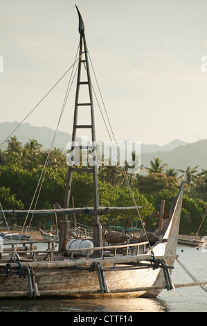 An exotic purse seine fishing boat called a Prahu Madura is docked in ...