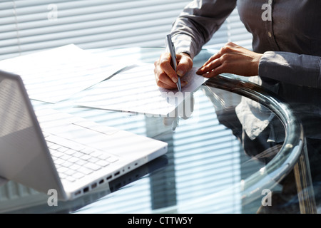 Business lady putting signatures on documents Stock Photo - Alamy