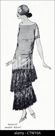 Illustration circa 1923. Paris fashions by designer CHANEL suit in fine ...