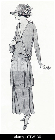 Illustration circa 1923. Paris fashions by designer CHANEL suit in fine ...