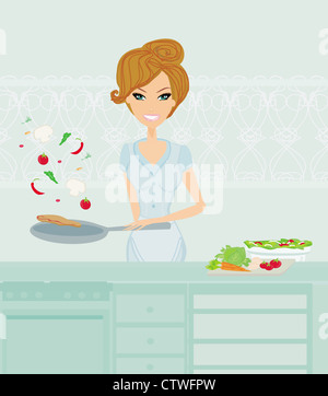 Beautiful lady cooking lunch Stock Photo - Alamy