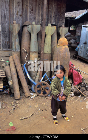 Scrap metal yard with US Vietnam War-era war scrap, cluster bomb ...