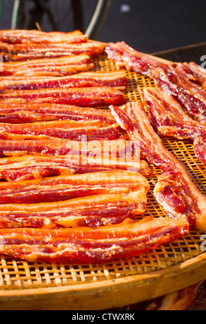 chinese dried meat in food curing process, photo is taken at Penang ...