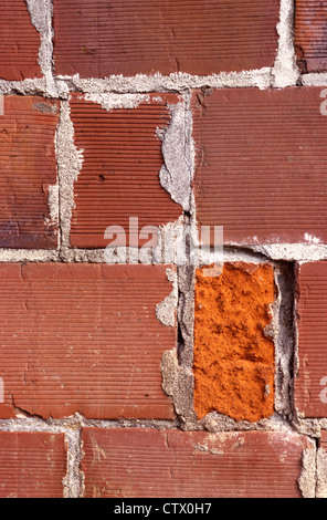 old red brick falling apart wall texture background Stock Photo - Alamy