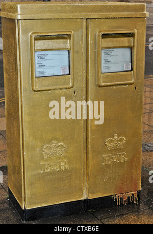 Royal Mail hastily gold painted post-box on Upper High Street ...