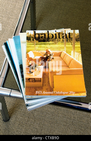 1973 Habitat Catalogue on glass topped OMK coffee table. For editorial ...