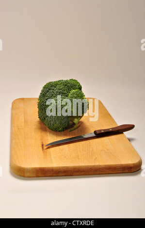 Fresh green broccoli on cutting board, food above Stock Photo - Alamy