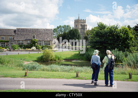Cottages on village green, Ducklington, Oxfordshire, England, United ...