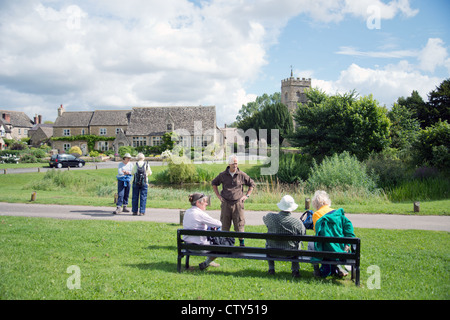 Cottages on village green, Ducklington, Oxfordshire, England, United ...