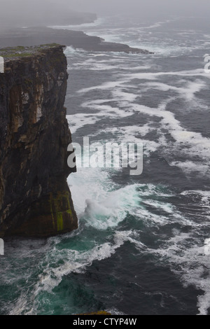 Rough ocean with high cliff monochrome landscape photo Stock Photo - Alamy