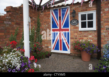 Door painted with Union Jack flag. Front door of house painted in red ...