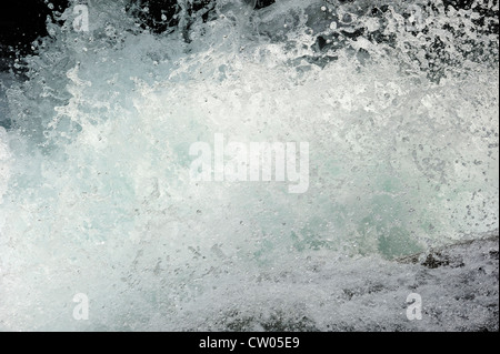 Water splashing in waterfall of the gave de Jéret in the Hautes ...