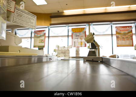 Supermarket check out, conveyor belt and displays for impulse selling ...