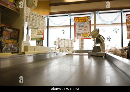 Supermarket check out, conveyor belt and displays for impulse Stock ...