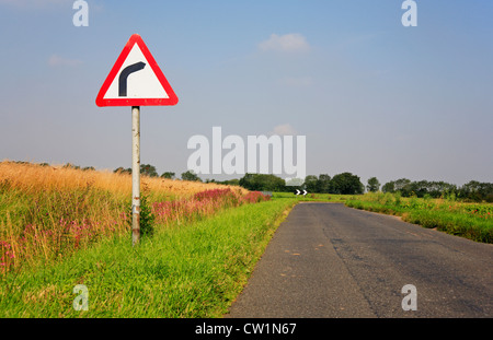 Warning road sign right hand bend Stock Photo: 111909928 - Alamy