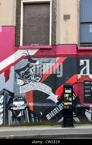 A colourful graffiti along the side wall of Nottingham Arts Theatre ...