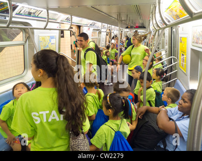 group of students on the subway Stock Photo - Alamy