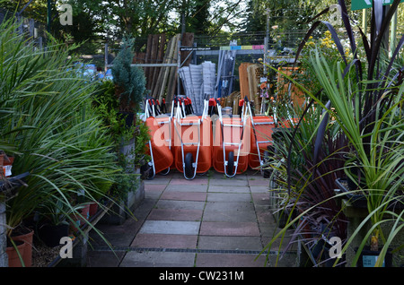 stack of garden wheelbarrows Stock Photo - Alamy