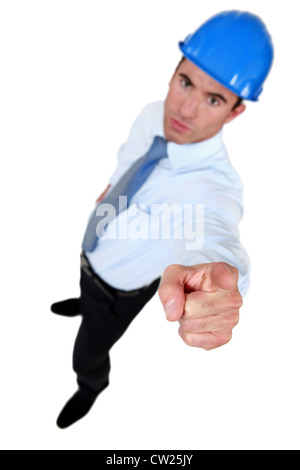 high angle shot of foreman standing cross-armed Stock Photo - Alamy