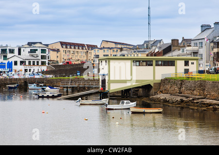 Portrush harbour with lifeboat and lifeboat station Stock Photo - Alamy