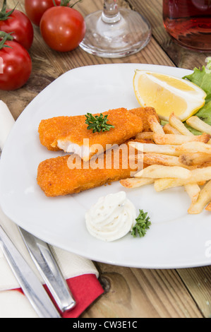 fresh fish fingers with remoulade sauce. breaded fish fingers with ...
