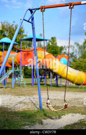 broken swing seat Stock Photo - Alamy