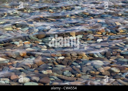 Pebbles under water, high angle view Stock Photo - Alamy