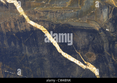 Rock pool with a white vain running through black stone, Lettermullan ...