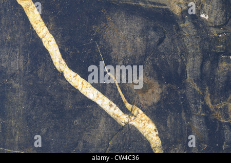 Rock pool with a white vain running through black stone, Lettermullan ...