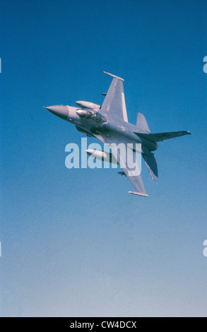 Low angle view of an F-16 Fighting Falcon aircraft armed with an AIM-9 ...