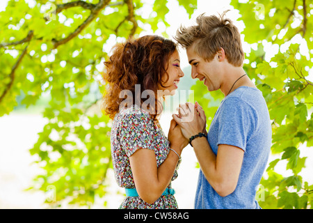 Romatic couple embracing outside Stock Photo - Alamy