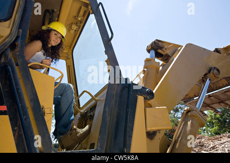 Woman operating bulldozer at a construction site Stock Photo - Alamy
