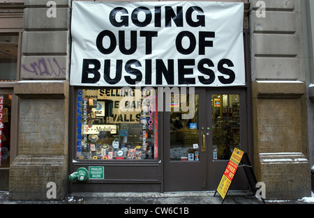 A logo sign and 'Going Out Of Business' banner outside of Younkers ...