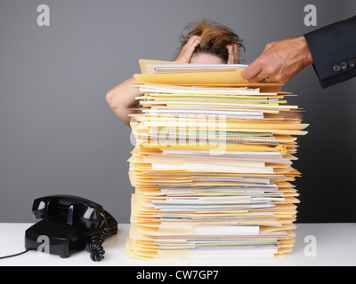 Overworked Secretary In Office Stock Photo - Alamy