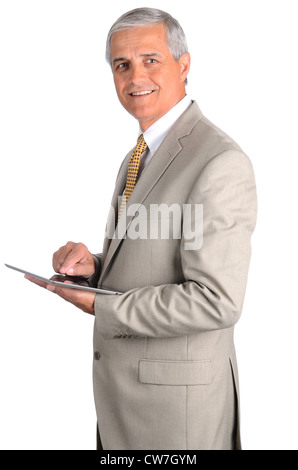 Studio portrait of a middle-aged businessman on a black background ...