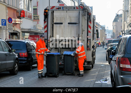 Germany, garbage collection, men, bins, emptying, garbage truck, detail ...