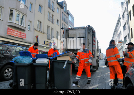Germany, garbage collection, men, bins, emptying, garbage truck, detail ...