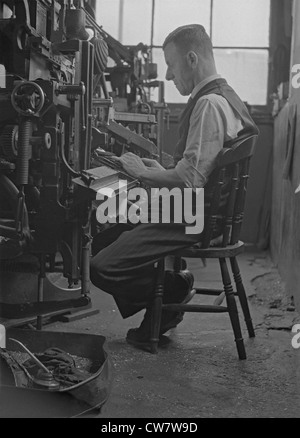 The keyboard of an old Linotype machine Stock Photo - Alamy