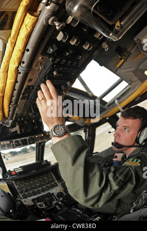 Capt. Shane Praiswater, 20th Bomb Squadron pilot, checks the ...