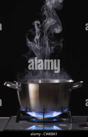 A vertical shot of flame and smoke from burning wood in a bonfire Stock ...