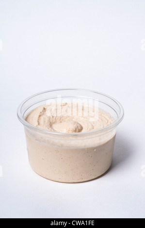 Tub of humus Stock Photo - Alamy