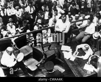 Clarence Darrow, left, and William Jennings Bryan speak with each other ...