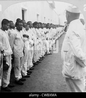 500 prisoners in formation against a wall, under guard, at the San Juan ...