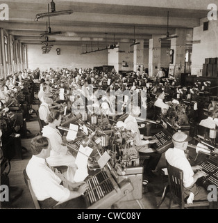 100 workers setting type on monotype machines, each with a 120-key ...