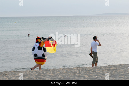 Spain, Mallorca, German tourists on the beach in the sun Stock Photo ...