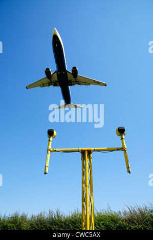 Directly underneath a low flying passenger plane taking off or landing ...