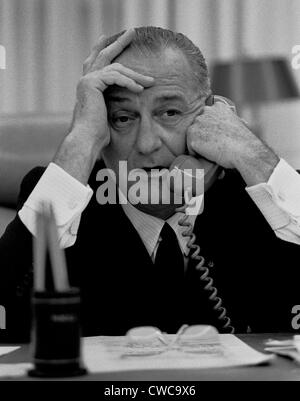 President Lyndon Johnson working in bed after gall bladder surgery ...
